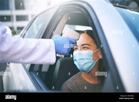 The Digital Way To Detect A Hidden Virus A Masked Young Woman Getting