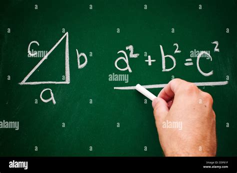 Pythagorean Theorem Sketched With White Chalk On A Chalk Board Stock