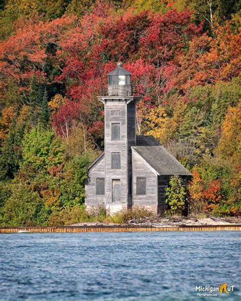 Grand Island Lighthouse With A Colorful Autumn Backdrop Munising Mi