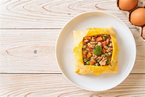 Egg Wrap Or Stuffed Egg With Minced Pork And Vegetable Stock Image