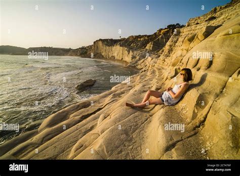 Scala Dei Turchi At Sunset A Tourist Watching The Sunset Realmonte