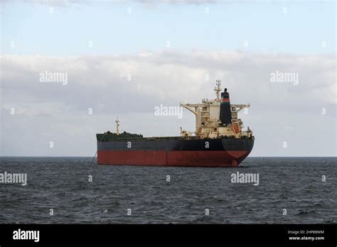 Cargo Ship At Anchor On The Road Bulk Cargo Vessel At Sea Logistics Import And Export Business