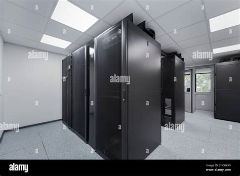 Data Center With Multiple Rows Of Fully Operational Server Racks Modern Telecommunications