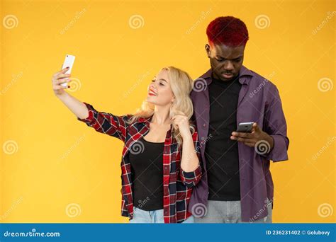 Introvert Extrovert Text Carved On Wooden Signpost Outdoors In Nature Royalty Free Stock