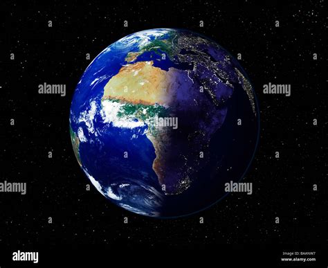 earth viewed from space showing transition between night and day over
