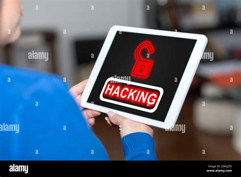 Tablet Screen Displaying A Hacking Concept Stock Photo Alamy