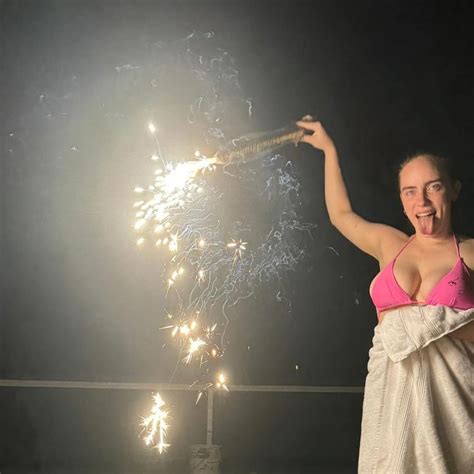 Billie Eilish Offers A Rare Look At Her Vacation Style With A Red String Bikini in Barcelona