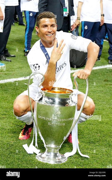 Real Madrids Cristiano Ronaldo With Cup During The Champions League