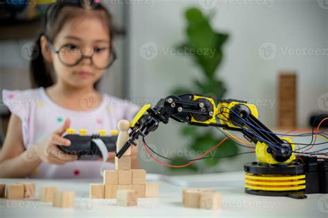 Stem Education Concept Asian Students Learn At Home By Coding Robot Arms In Stem Mathematics