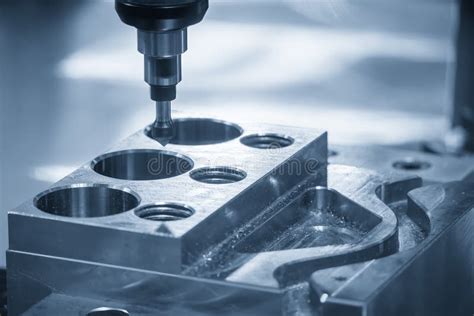 The Cnc Milling Machine Chamfer Cutting Mold Base Part By Chamfer Tool In The Light Blue Scene