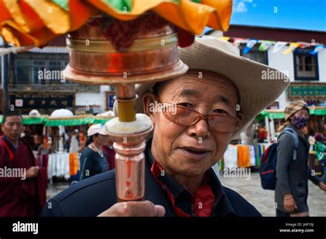 Tibetan Buddhist Devotees Do The Kora Clockwise Circumambulation Around Jokhang Temple Lhasa