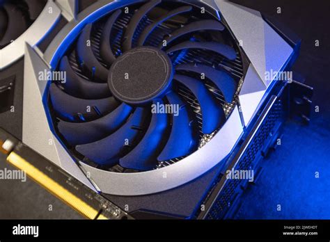 Gpu Graphics Card Fan Top View Cooler Fan Close Up In Bright Blue Light On Black Pc Hardware