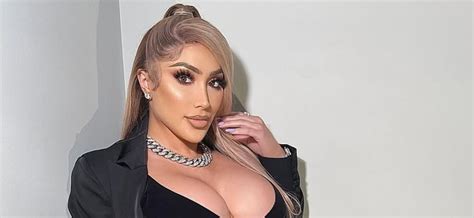 Nikki Mudarris Nearly Pops Out Of Wet Tank Top In Latest Shoot