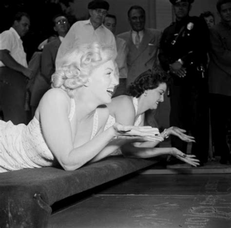 Marilyn Monroe And Jane Russell Putting Their Handprints And Footprints