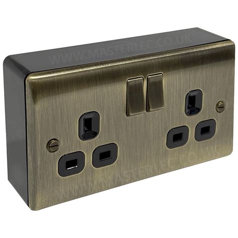 Antique Brass 2 Gang Double Socket And 32mm Black Surface Pattress Back