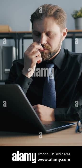 Man Uses Cold Office Spray While Working At His Desk To Stay Refreshed And Focused Stock Video