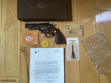 Colt Python 357 Magnum Bright Nickel 4” Barrel New Unfired In The Box With Owners Manual Hang