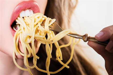 Sensual Lips Open Mouth Close Up Girl Eats A Pasta Spaghetti Premium