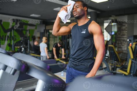 Man Running On Treadmill In Gym Stock Photo At Vecteezy