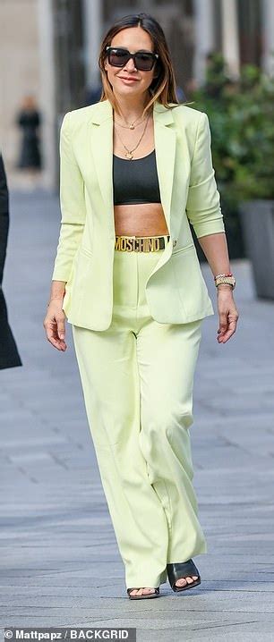 Myleene Klass Flashes Her Toned Abs In A Black Crop Top And Lime Green