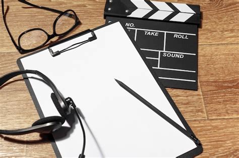 Premium Photo Film Clapper Board On A Table