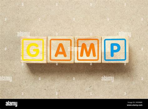 Wooden Alphabet Letter Block In Word Gamp Abbreviation Of Good Automated Manufacturing Practice
