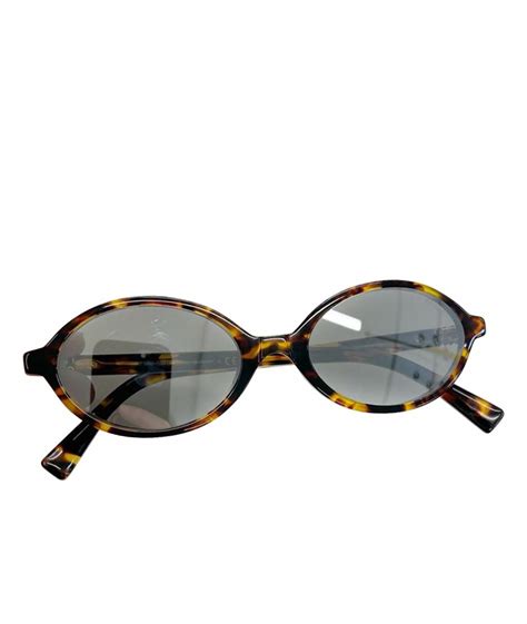 Miu Miu Коричневые пластиковые солнцезащитные очки для женщин купить в интернет магазине с
