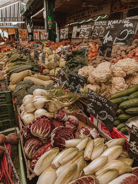 Table Covered With Different Types Of Vegetables In One Of The Vegetable Markets In Vienna