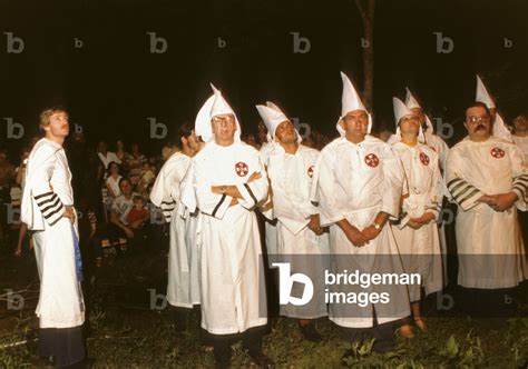 Image Of Kkk Members Prepare For Their Cross Burning In Their Hateful