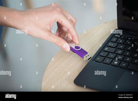 Memory Stick Being Inserted Into A Laptop Stock Photo Alamy