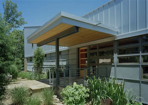 Bowtie House By Demx Architecture Has An Angular Metal Roof