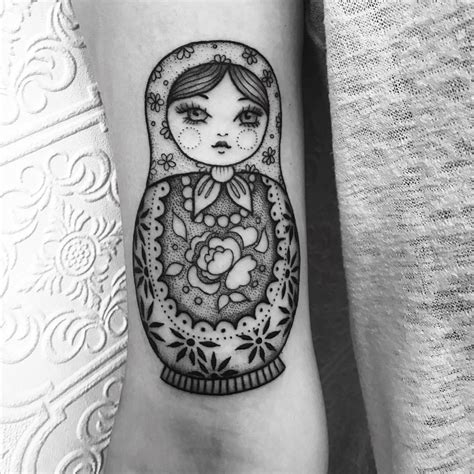 China Doll Tattoo Piercing