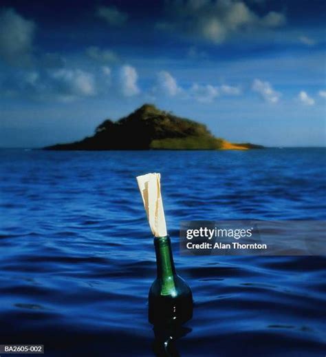 Piece Of Paper Floating In Water Photos And Premium High Res Pictures