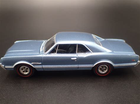 1966 66 Olds Oldsmobile 442 Blue 1 64 Scale Limited Diorama Diecast Mo