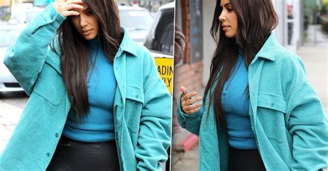 Photos Kim Kardashian Shows Off Boobs In Skintight Sweater