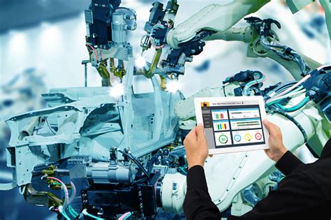 Iot Industry 40 Conceptindustrial Engineer Using Software In Tablet To Monitoring Machine In