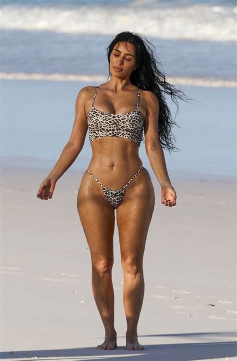 Kim Kardashian Shows Off Her Curves At The Beach In String Bikini See Pics