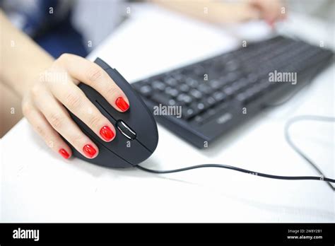 Girl S Hand Uses A Vertical Ergonomic Joystick Of A Computer Mouse Working At The Computer