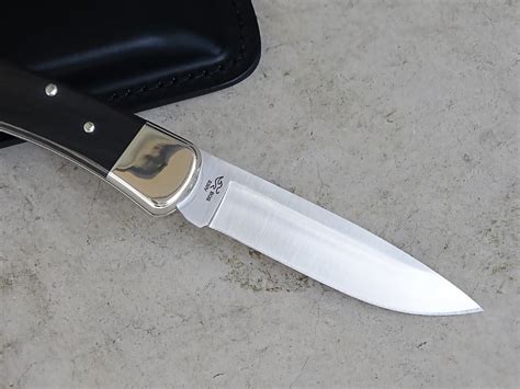 Buck 110 Folding Hunter Knife Nickel Silver S30v Drop Point Blade New