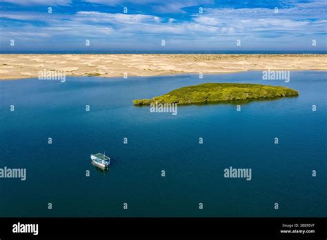 Aerial View Of Mangrove Island Boat And Sand Dunes Magdalena Bay