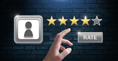 Hand Touching Rate Button With Star Review Icons Photo Background And