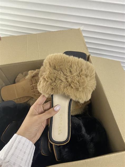 Пухнасті тапочки — ціна 750 грн у каталозі Шльопанці Купити жіночі речі