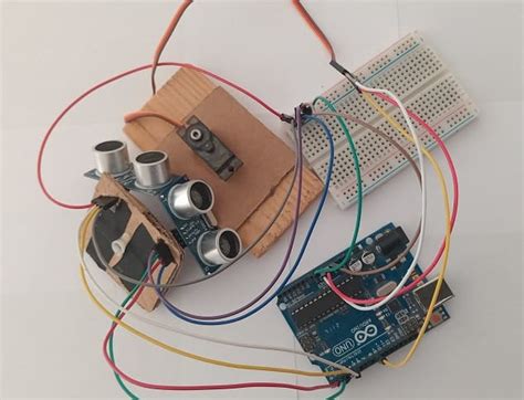 Système Mobile De Suivi Dun Objet En Mouvement Basé Sur Arduino Et Hc Sr04