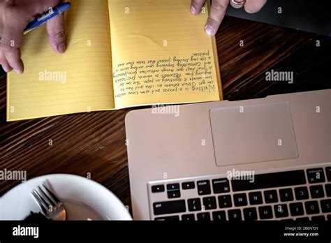 Taking Note Concept Hand Of A Young Businessman Taking Notes With A
