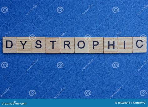 Word Dystrophic Made From Wooden Letters Stock Image Image Of