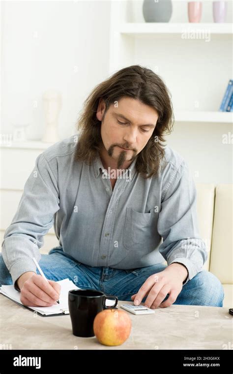 Man Writing Notes Stock Photo Alamy