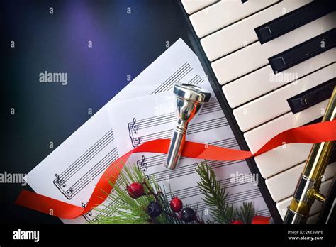 Christmas Musical Concert Concept With Piano And Wind Instruments With Christmas Decoration And Christmas Musical Concert Concept With Piano And Wind Instruments With Christmas Decoration And