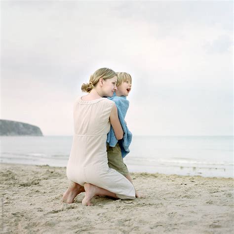 Mother And Son At The Beach By Stocksy Contributor James Ross Stocksy