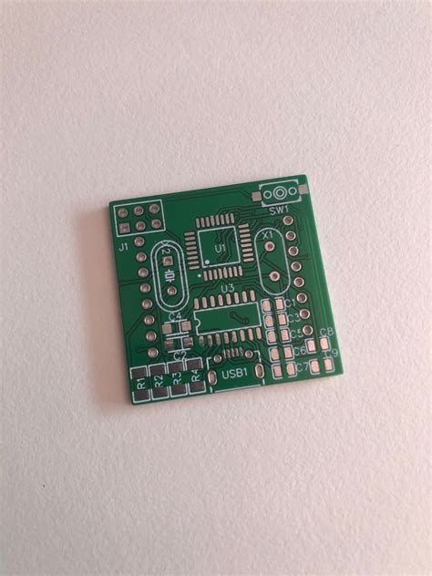 help electronics noobie trying to design his first atmega based pcb