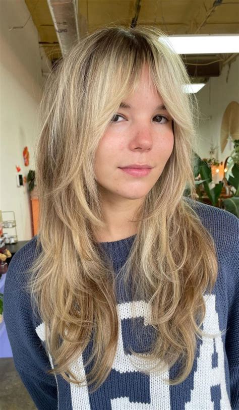 50 Beautiful Long Shag Haircuts For Effortless Style Soft Blonde